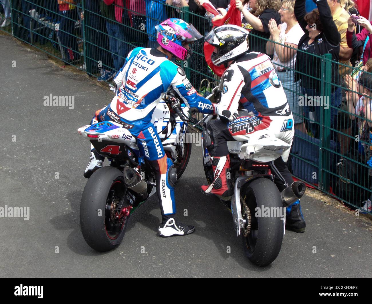 The high-angle view of two bikers - Isle of Man and senior Tourist ...