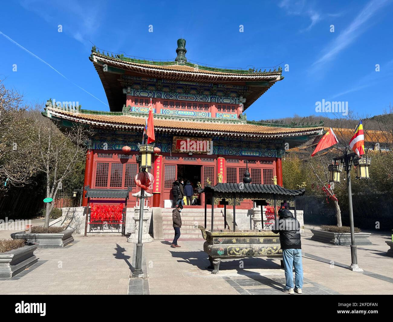 The facade of a traditional Chinese Buddhist Temple nestled in the ...