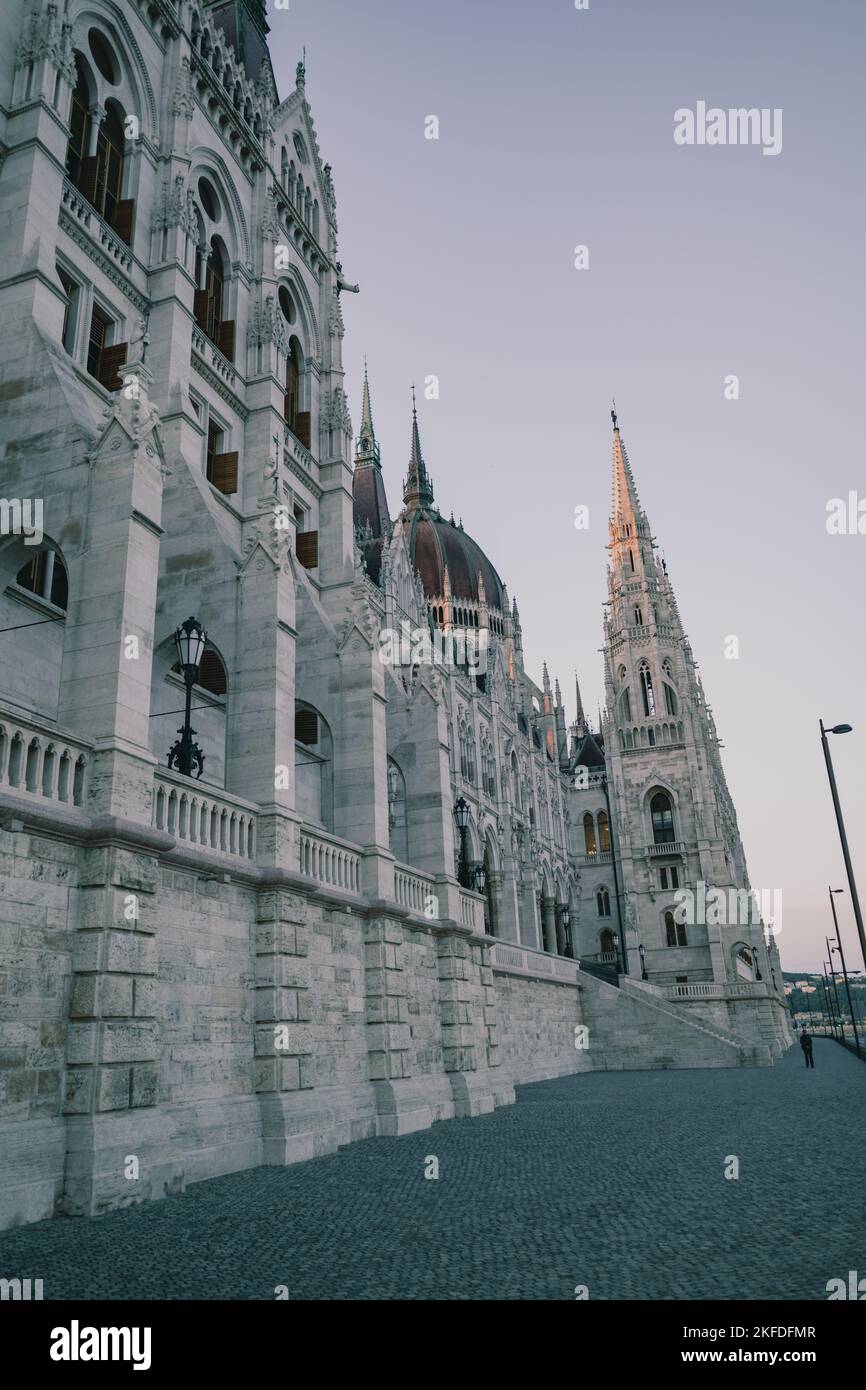 A vertical low angle grayscale shot of the Hungarian Parliament ...