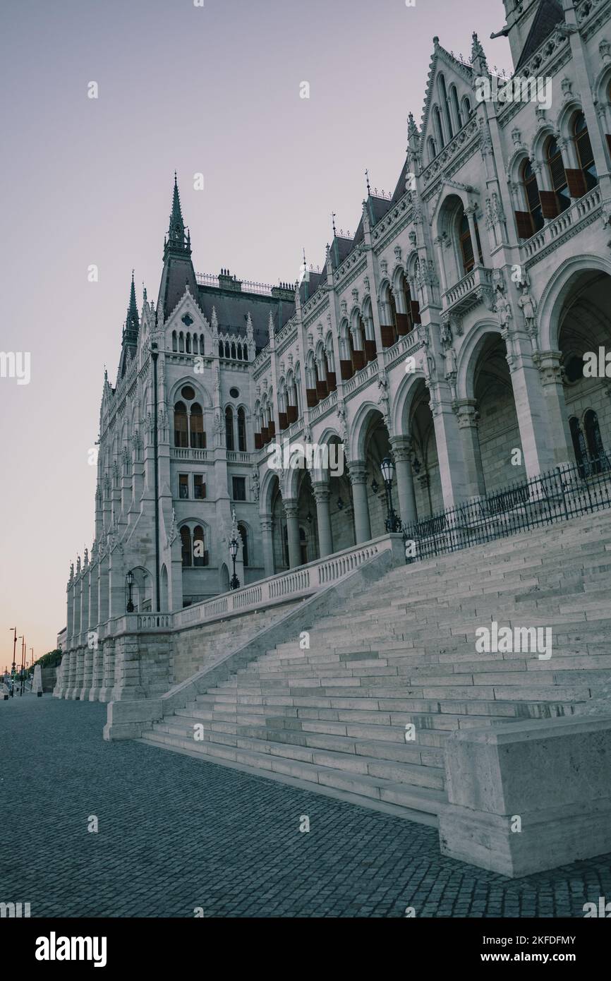 A vertical low angle shot of the Hungarian Parliament Building in ...