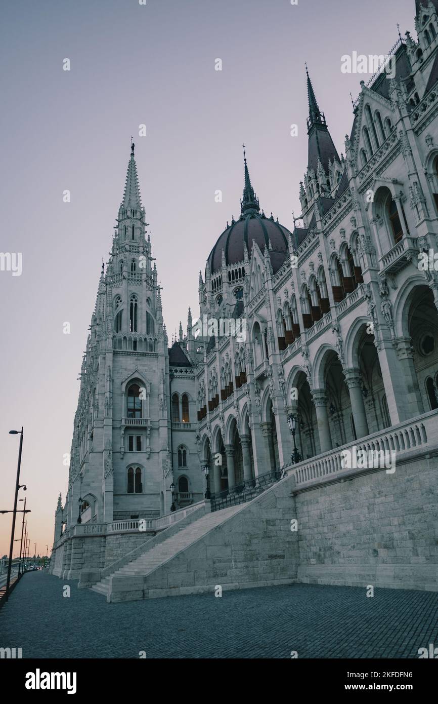 A vertical low angle shot of the Hungarian Parliament Building in ...