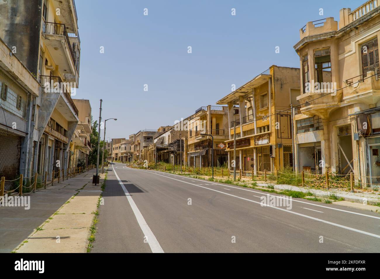 Abandoned avenue with empty buildings in the seaside resort of Varosha ...