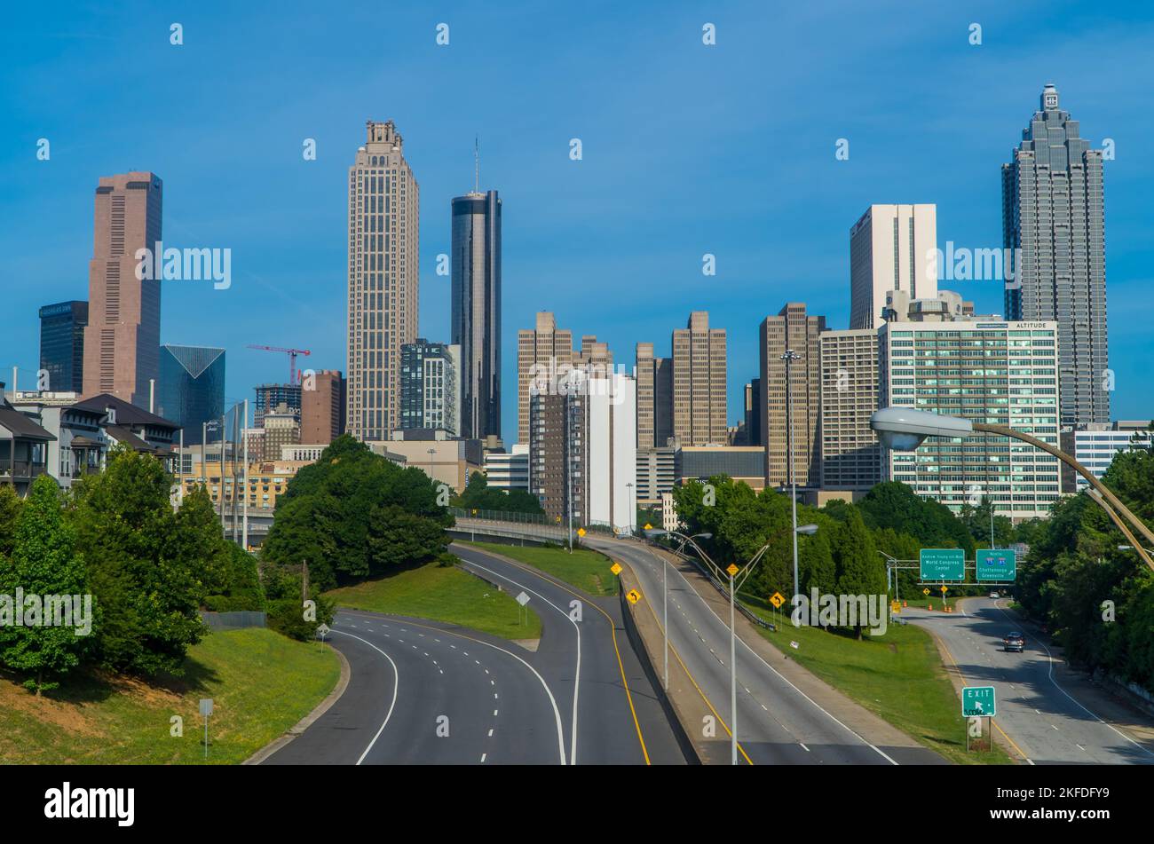 Downtown Atlanta skyline with a highway and trees during daytime Stock ...