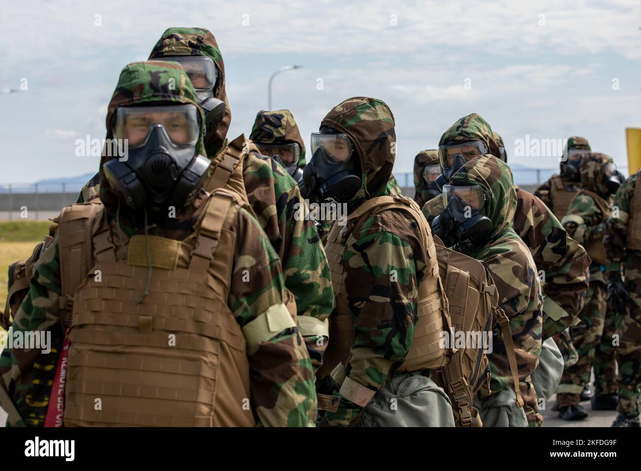 U.S. Marines with Marine Aviation Logistics Squadron stand by to remove ...