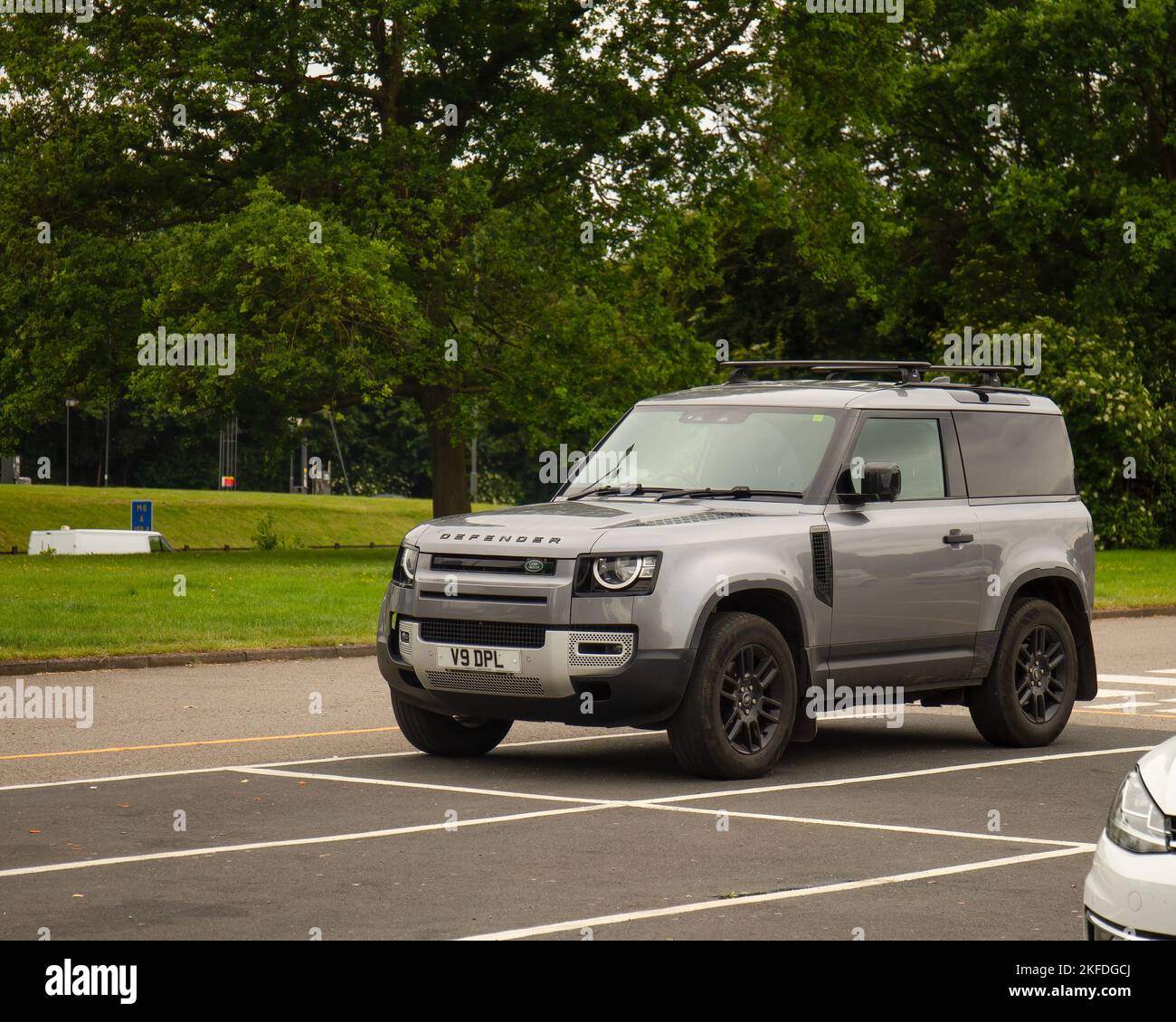 Silver Land Rover Defender 4x4 off-road British vehicle Stock Photo - Alamy