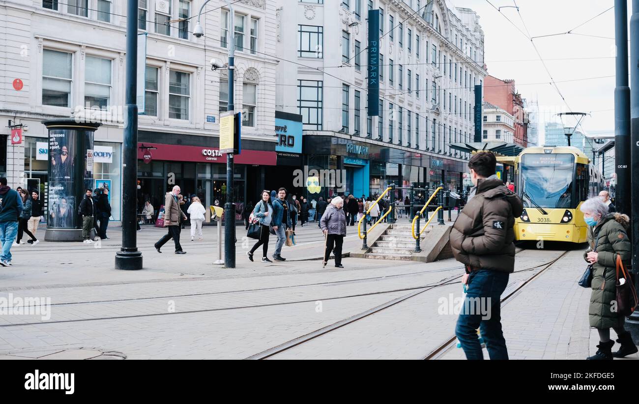 A view of people walking in the street of Manchester, The UK Stock ...