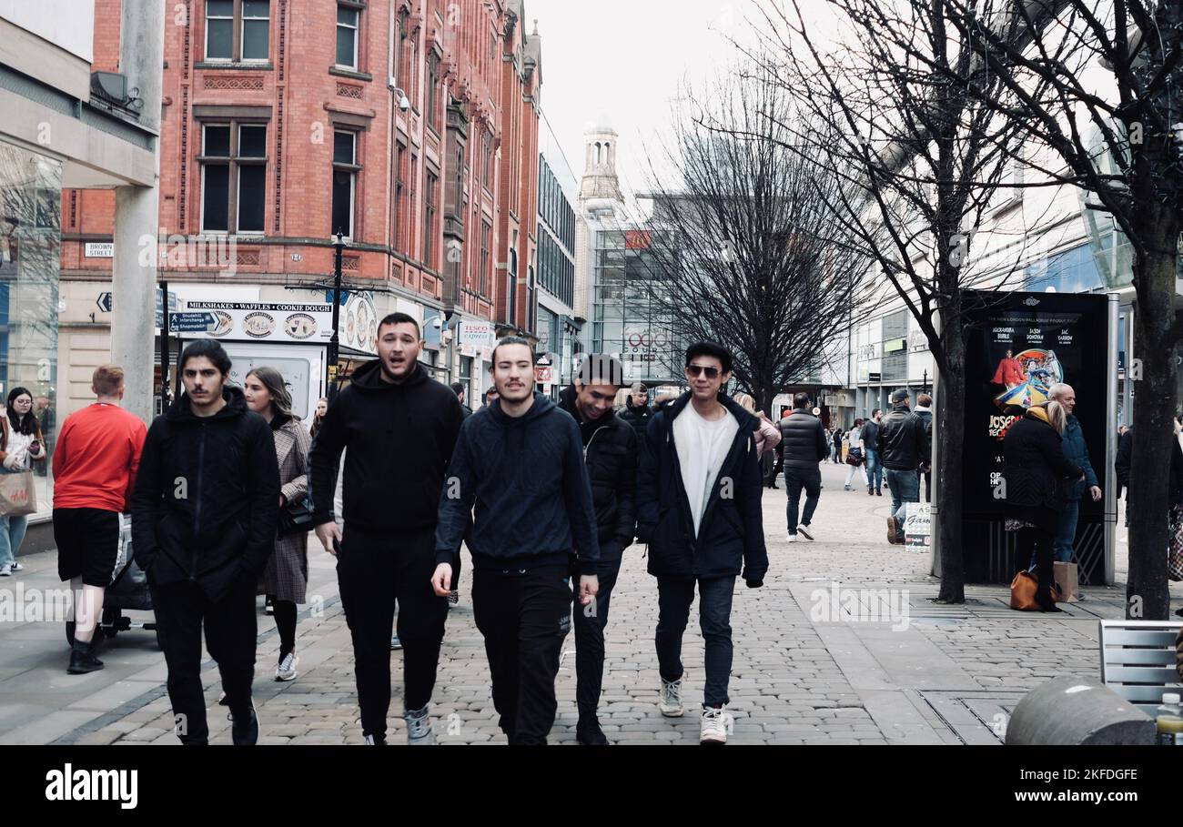 A view of people walking in the street of Manchester, The UK Stock ...