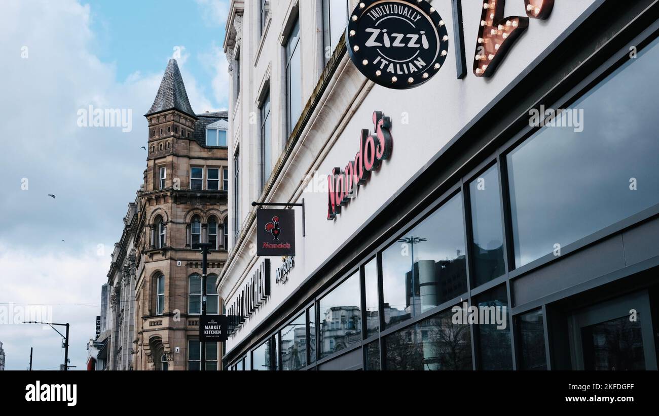 A beautiful view of buildings and cafes in Manchester, The UK Stock ...