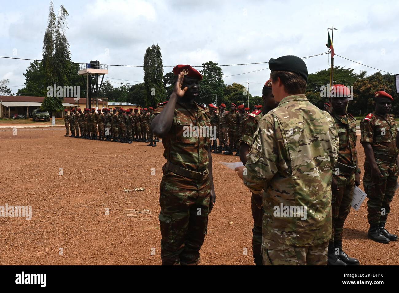 A Beninese soldier from the 1st Commando salutes a U.S. Army Green ...