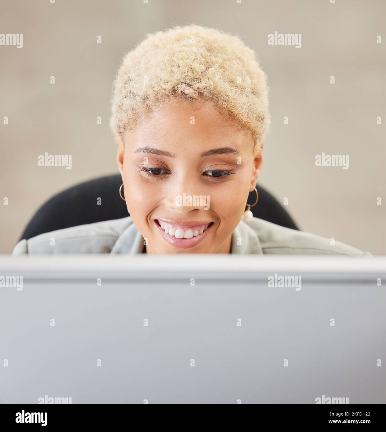 Happy, business woman and computer working in a startup office. Smile ...