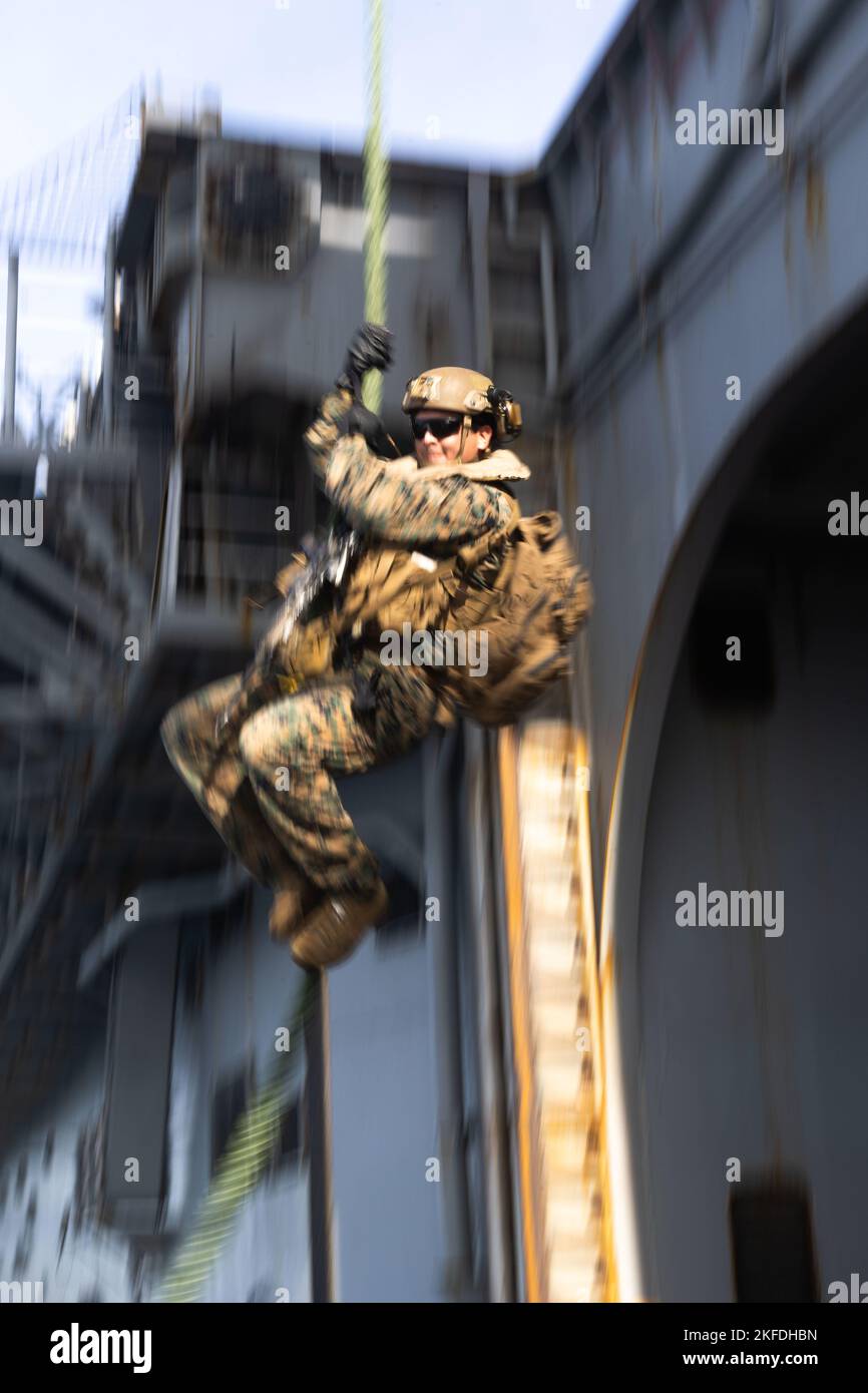 U.S. Marine Corps Sgt. Eric Dennin, with Battalion Landing Team 2/5 ...