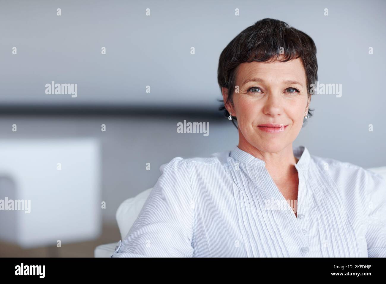 Sophisticated mature business woman. Portrait of sophisticated mature ...