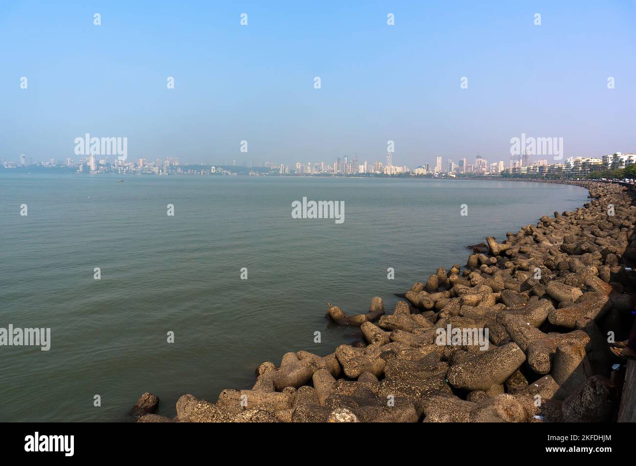View of the embankment of Mumbai with large stones and sky. Bombay sea ...