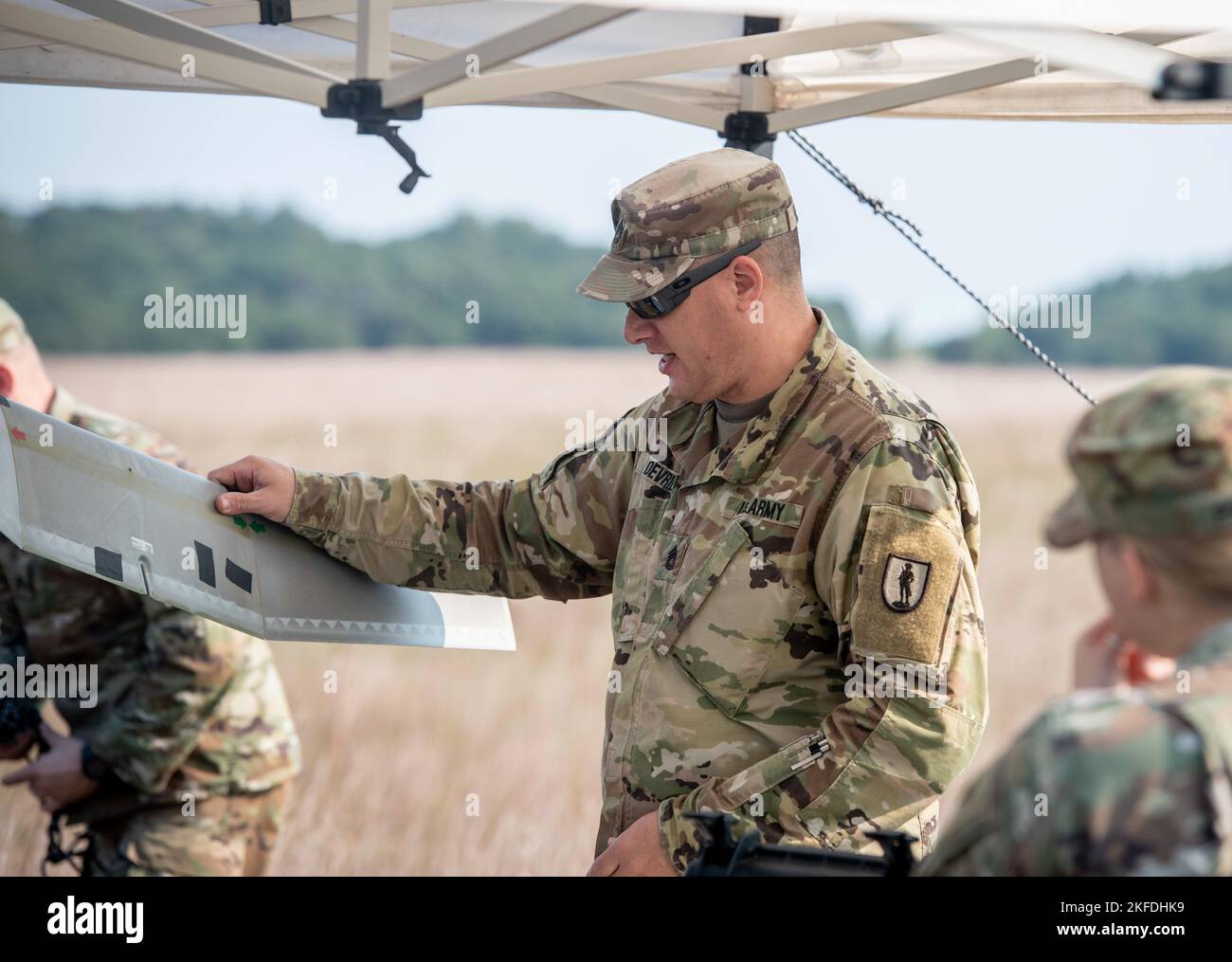 Wisconsin National Guard Soldiers fly an RQ-11B Raven Small Unmanned ...