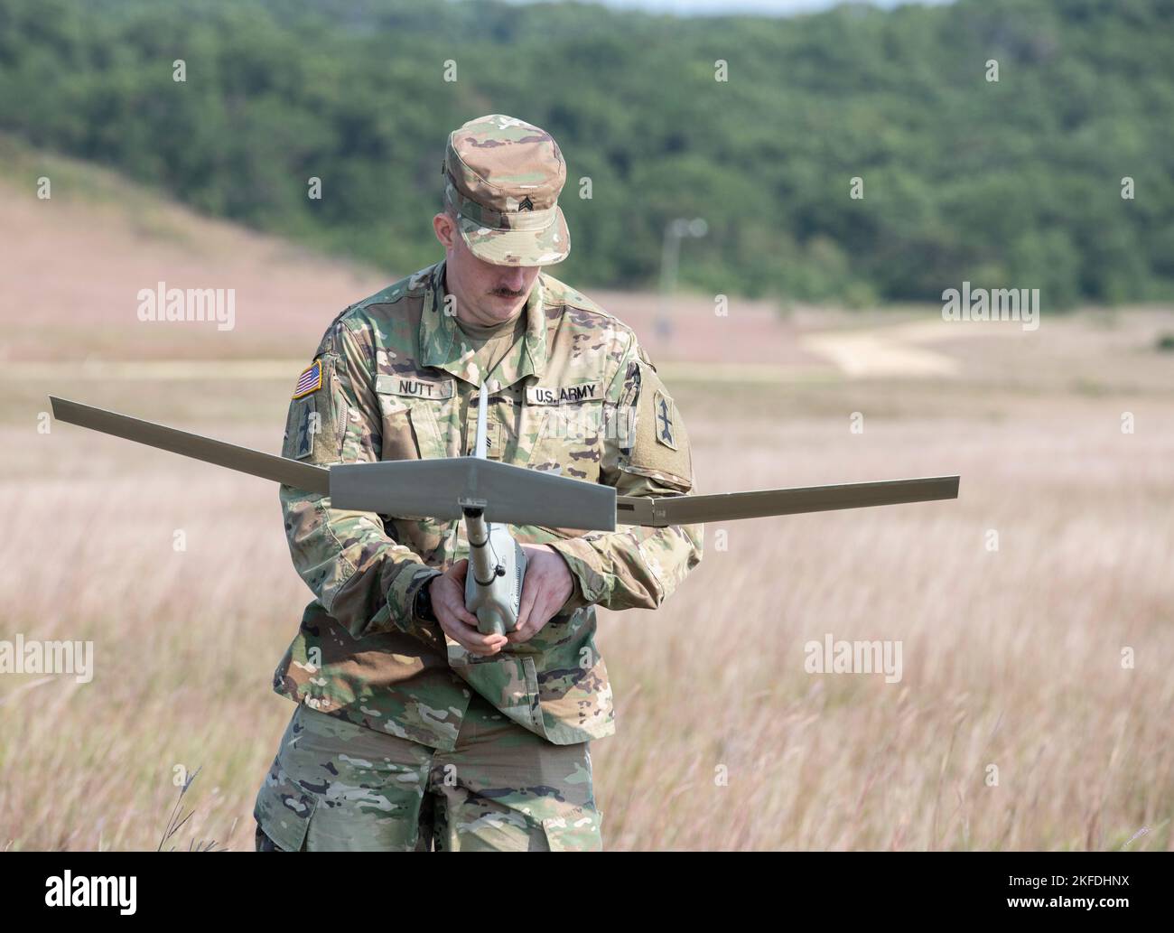 Wisconsin National Guard Soldiers fly an RQ-11B Raven Small Unmanned ...