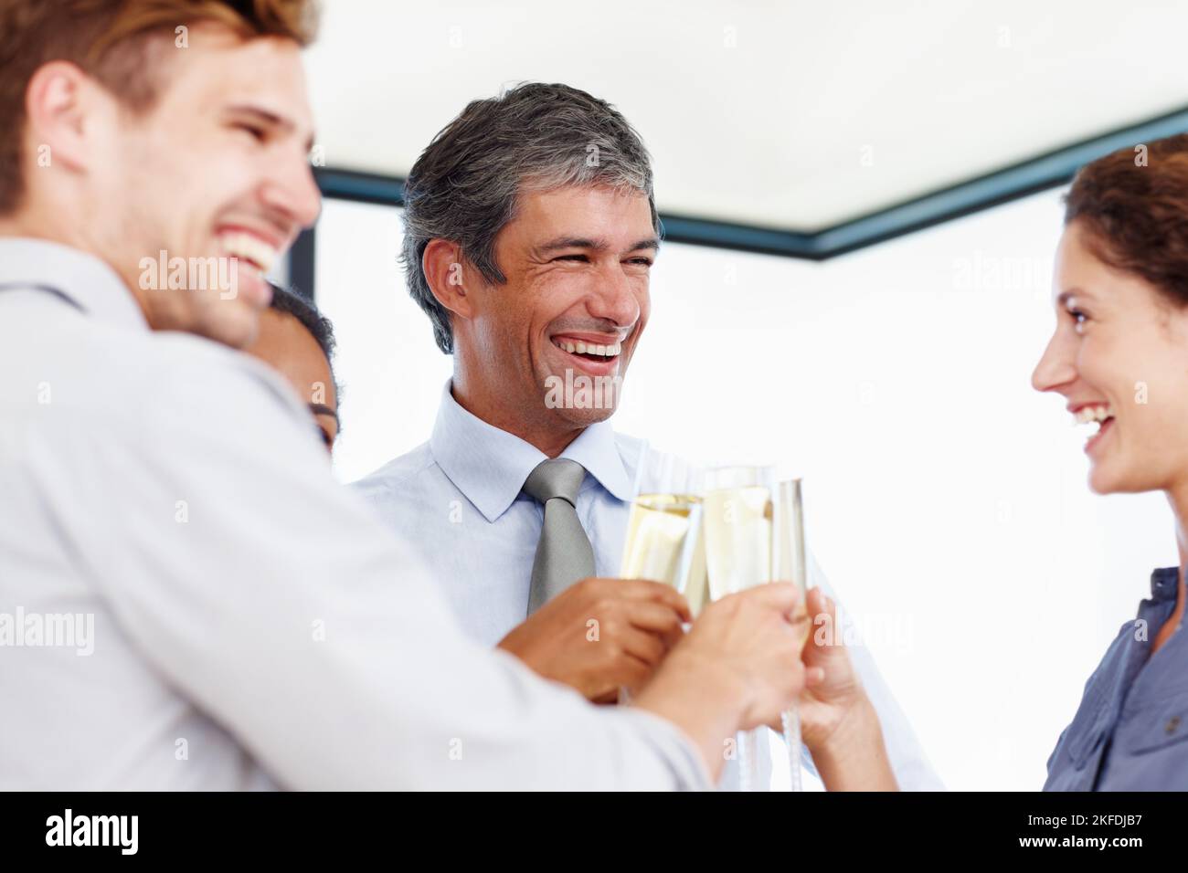 We couldnt have done it without teamwork. a group of businesspeople ...