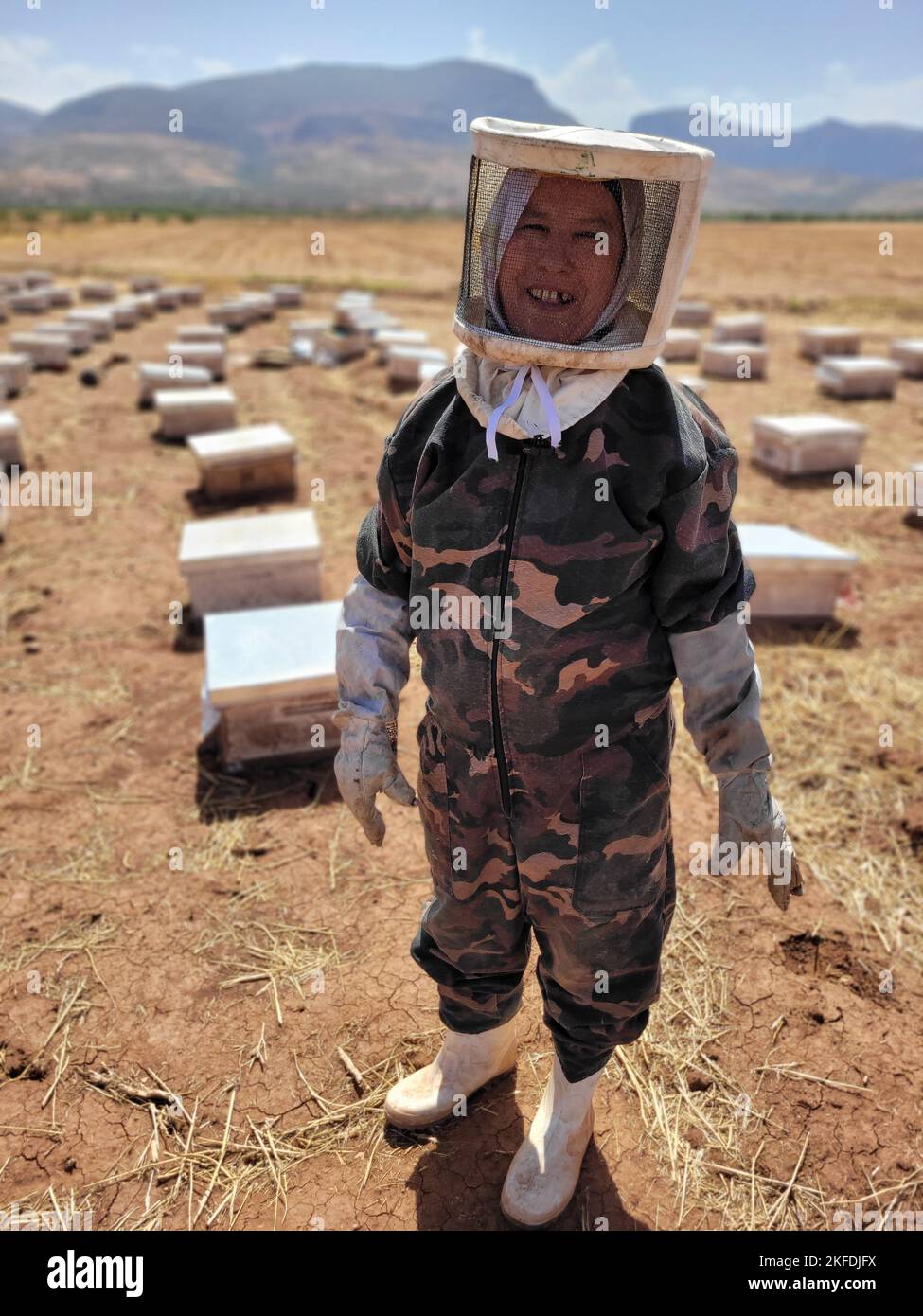 President of Cooperative Ennour, Fatima El Hadry, stands among the ...