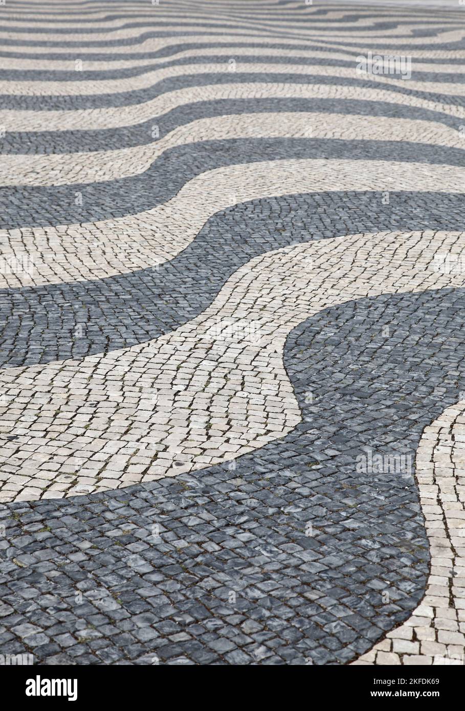 Traditional Portuguese cobblestone pattern in Lisbon Portugal Stock ...