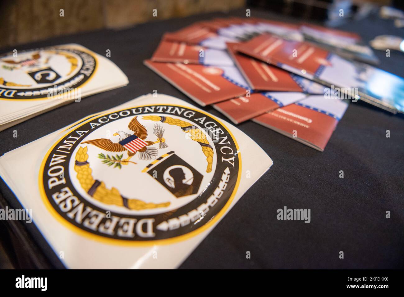 Defense POW/MIA Accounting Agency (DPAA) memorabilia sits on a table ...