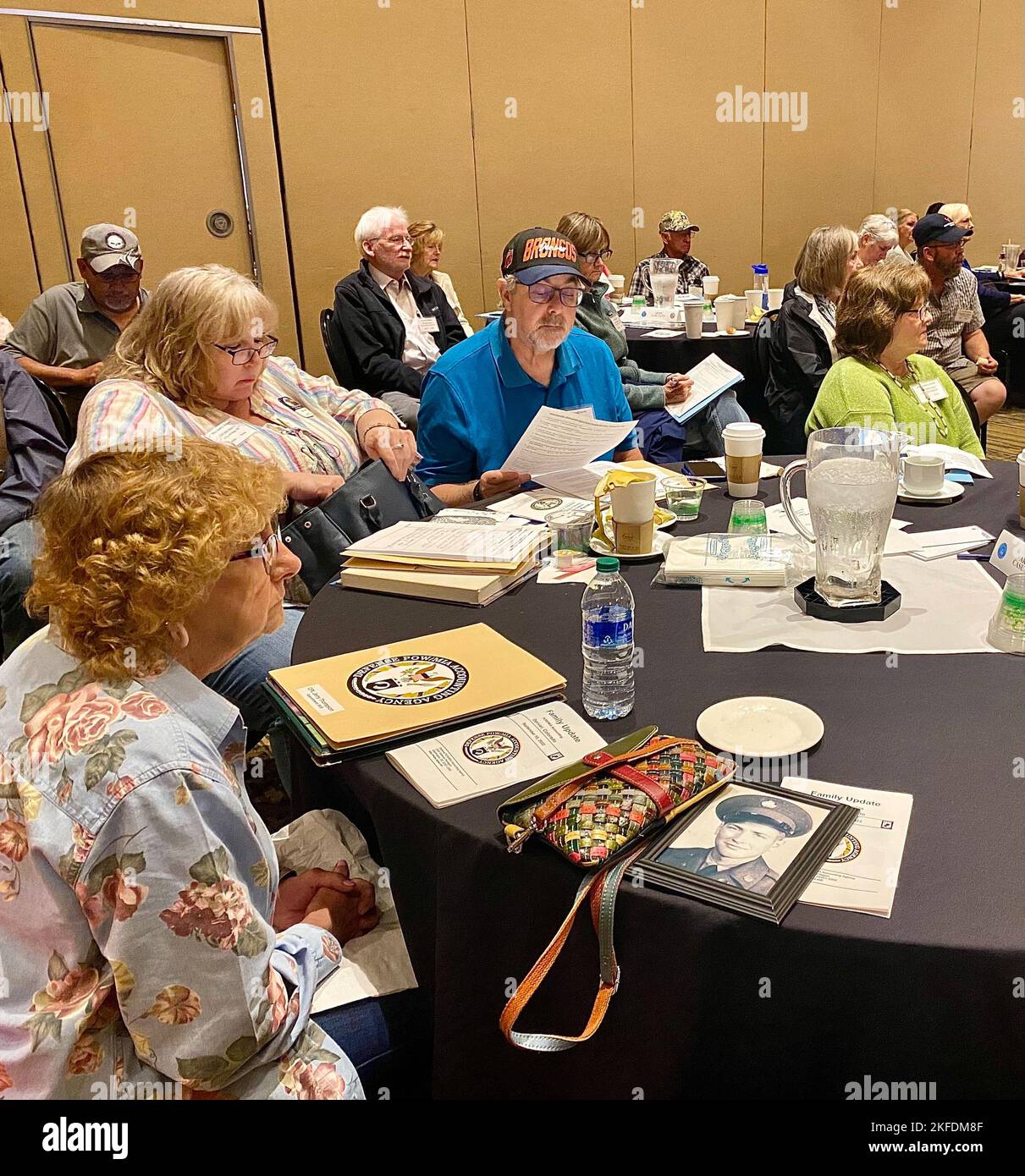 Family members of missing service members listen during a Family Member ...