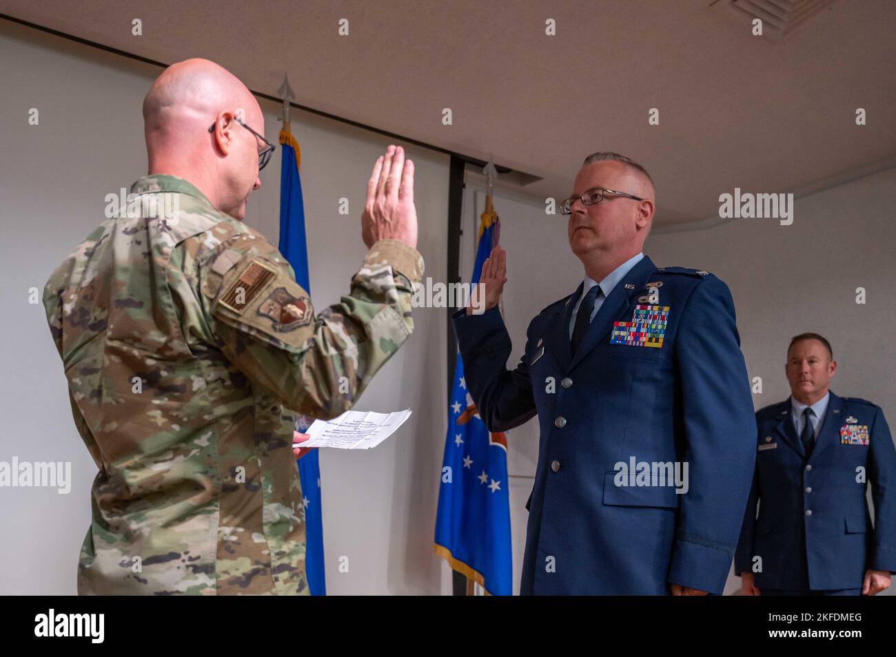 U.S. Air Force Maj. Scott Crane, Missouri Air National Guard, recites ...