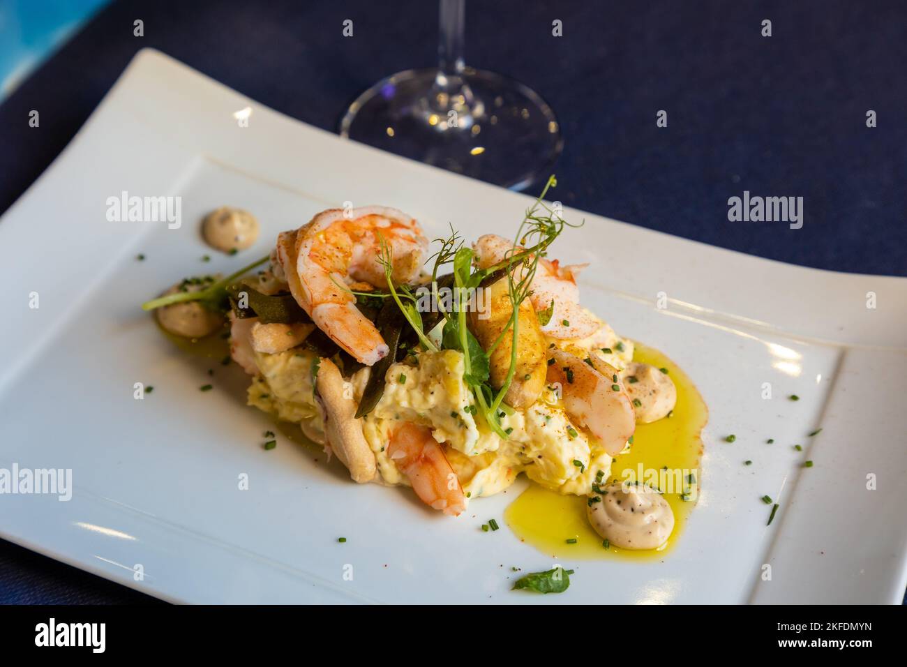 A closeup of a salad with shrimp served on a plate Stock Photo - Alamy
