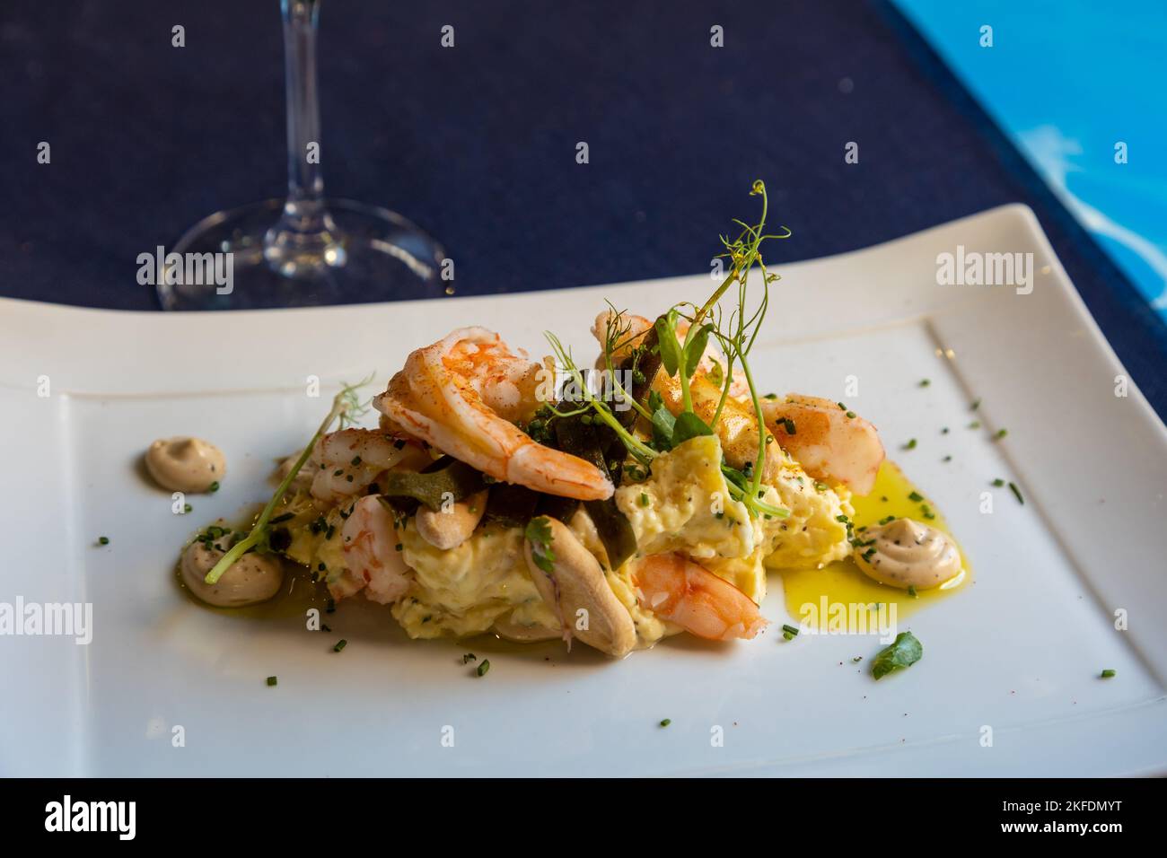 A closeup of a salad with shrimp served on a plate Stock Photo - Alamy
