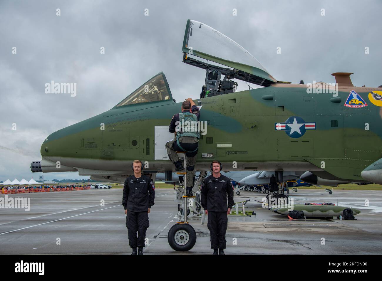 Maj. Haden Fullam, middle, the A-10 Demonstration Team pilot, climbs ...