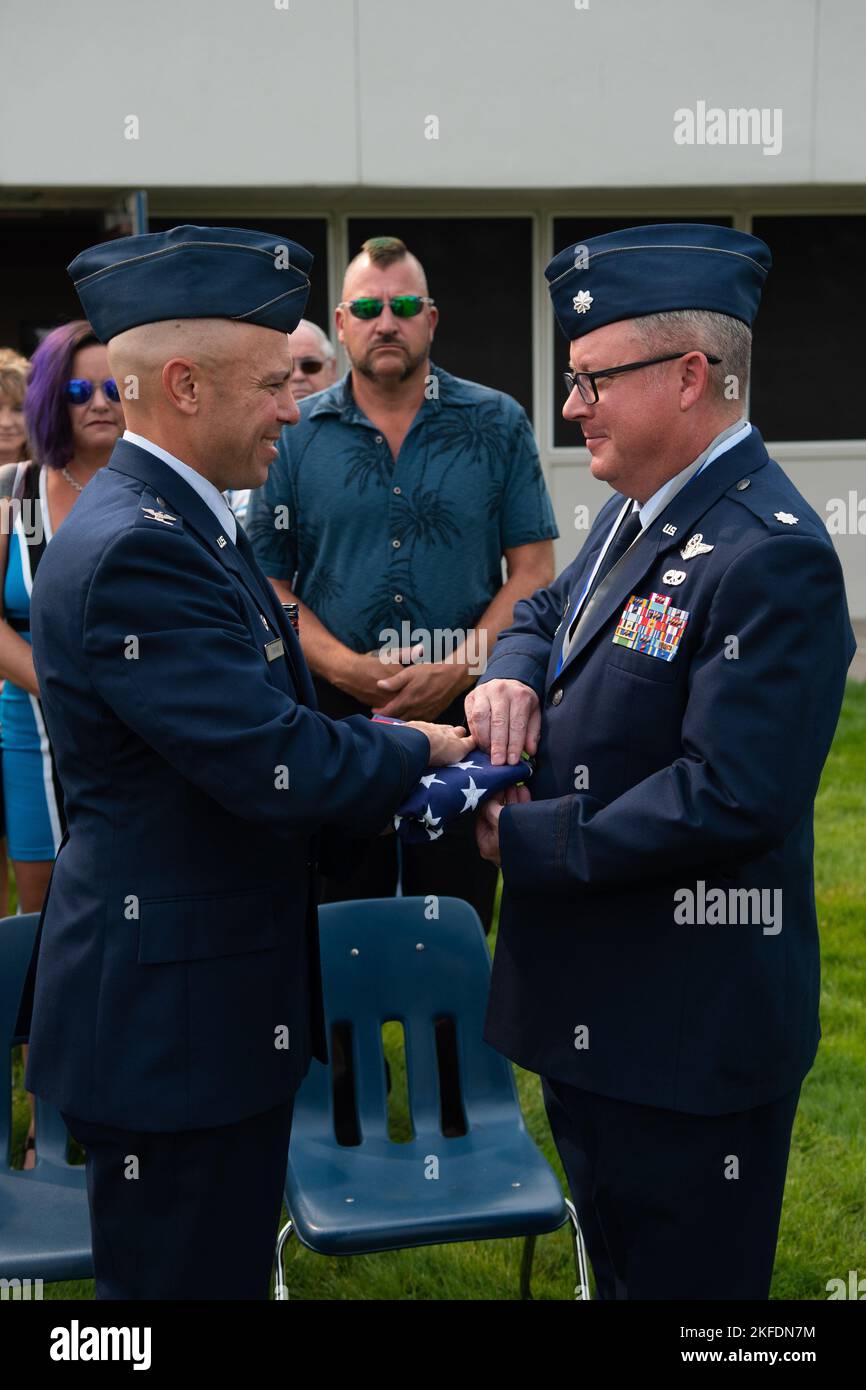 Col. David Chauvin presents the U.S. Flag to Lt. Col. Hudson at a ...