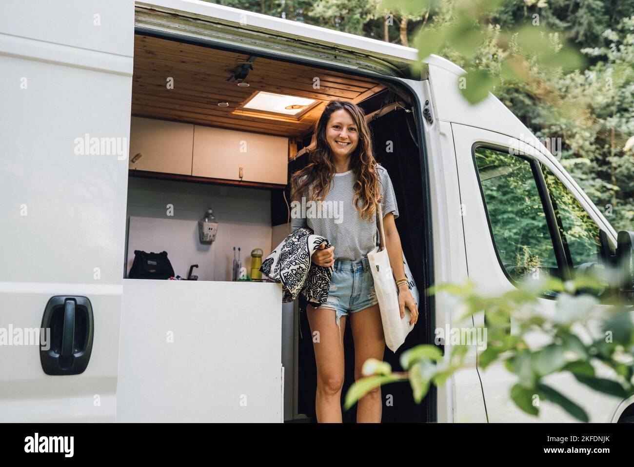 Female model posing with car hi-res stock photography and images - Alamy