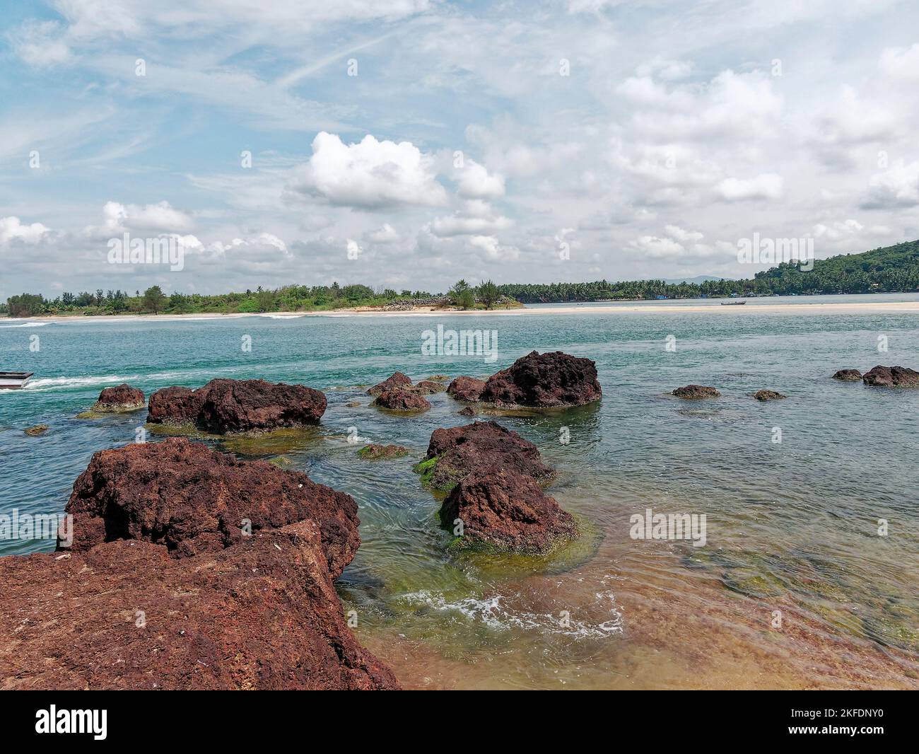 Rocky sea shore of Betul beach in state Goa India Stock Photo - Alamy