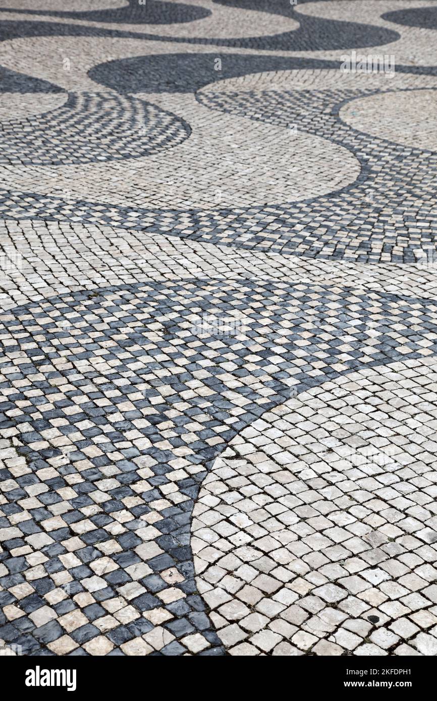 Traditional Portuguese cobblestone pattern in Lisbon Portugal Stock ...