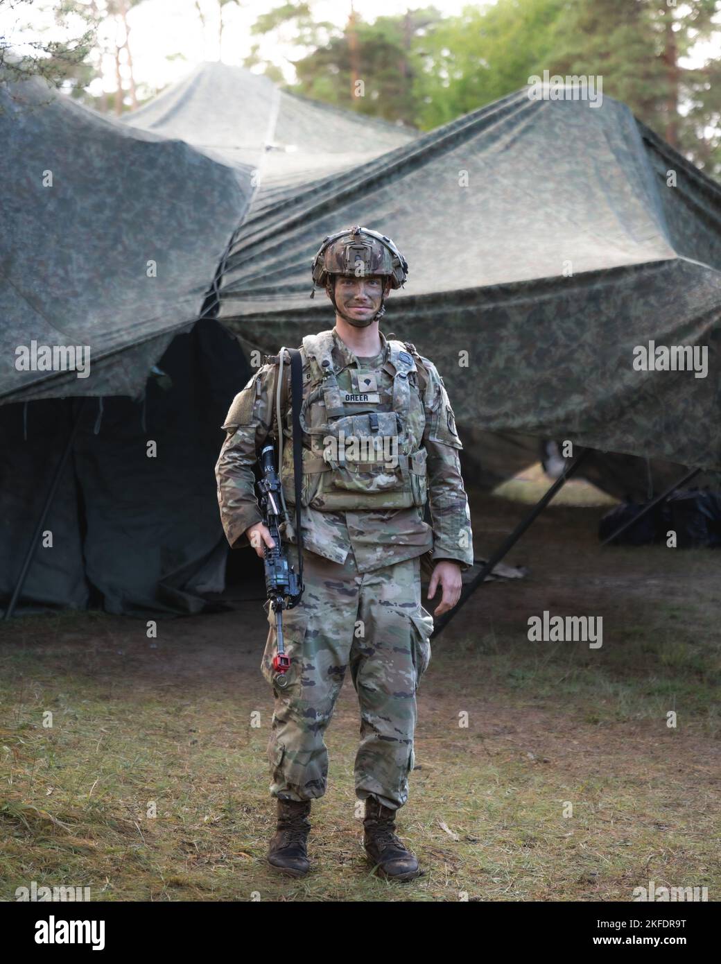 A U.S. Army paratrooper assigned to the 173rd Airborne Brigade poses ...