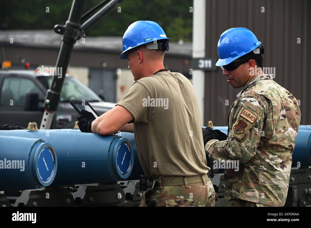 U.S. Air Force Staff Sgt. Aaron Seymour, a conventional munitions ...