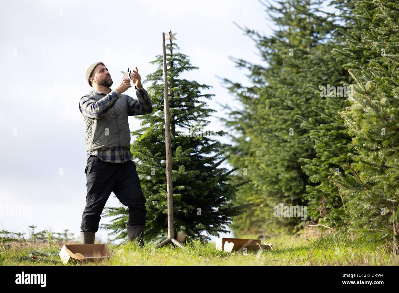 10 November 2022, Lower Saxony, Osnabrück: Inventor Nico Stisser screws ...