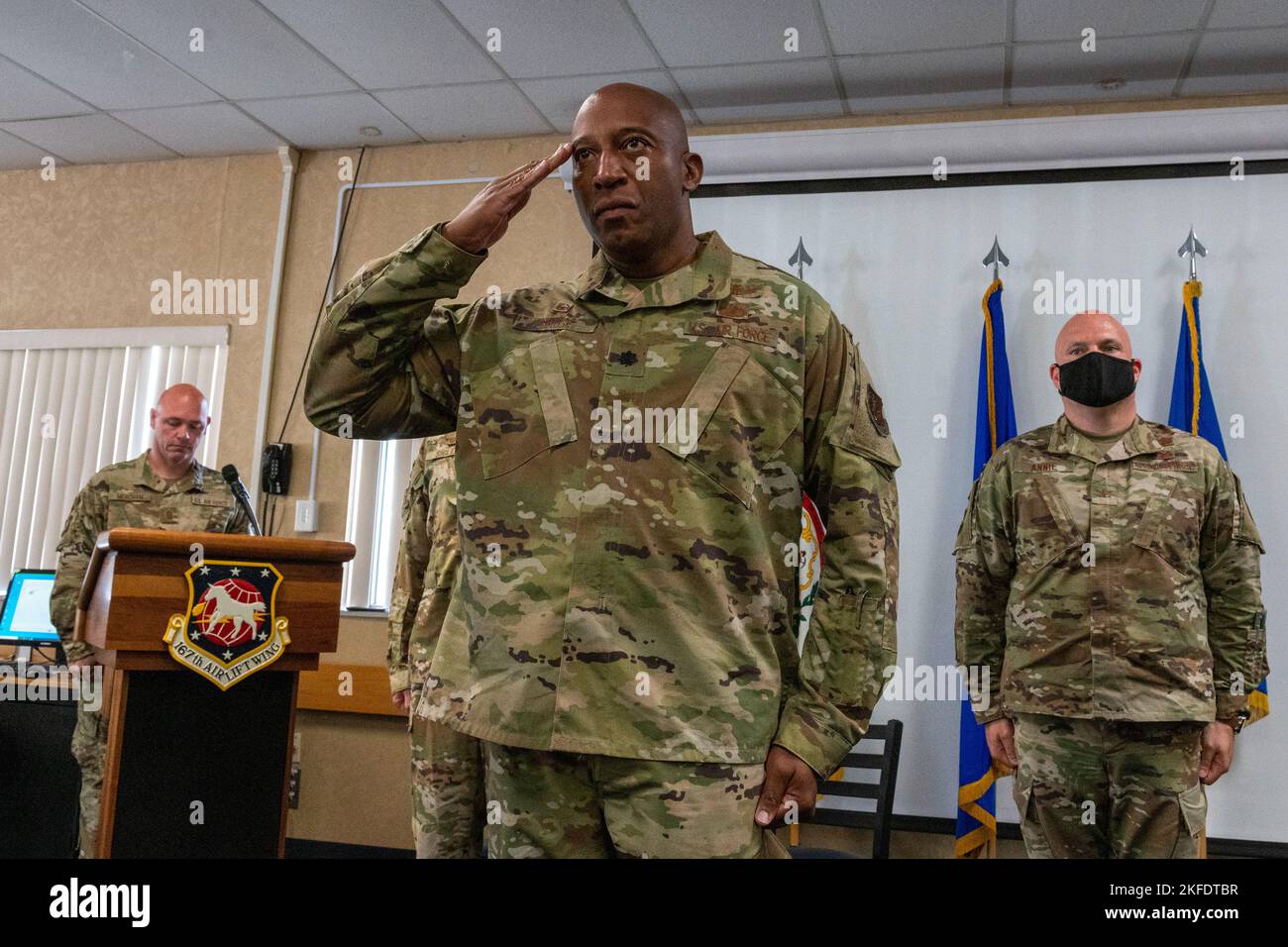 U.S. Air Force Lt. Col. Corey Gause, renders his first salute to the ...