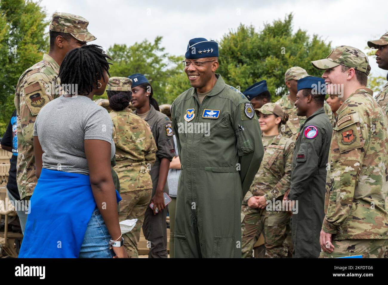 Air Force Chief of Staff Gen. CQ Brown, Jr., (center) speaks with ...
