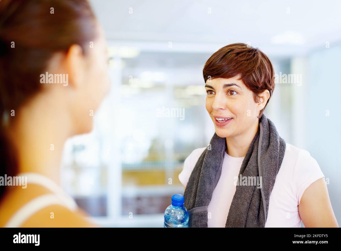 Best friends enjoying time together after a workout. Beautiful fitness ...