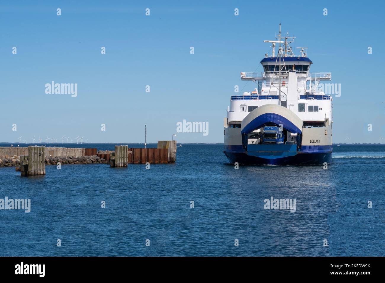 The "Lolland" ferry entering the port of Spodsbjerg, Denmark Stock ...