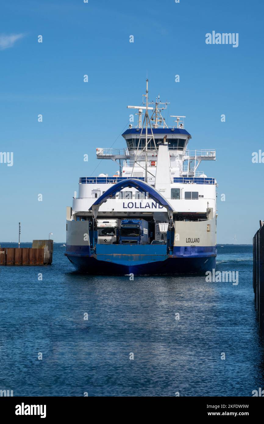 A vertical shot of "Lolland" ferry entering the port of Spodsbjerg ...