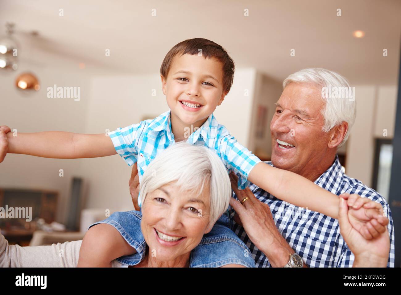Grandparents are the best. a young boy with his grandparents Stock ...