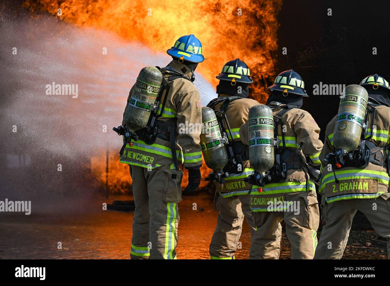 Firefighters from the 97th Civil Engineer Squadron (CES) and 507th CES ...