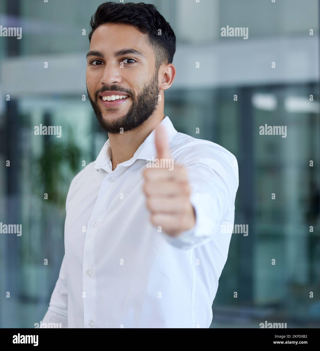Thumbs up, success and businessman with a thank you, smile and ...