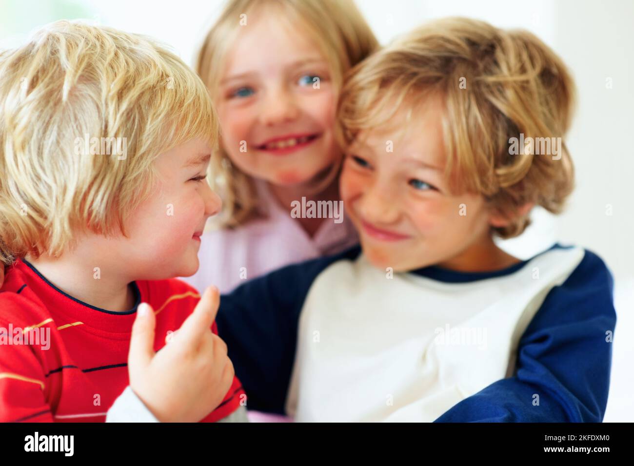 Happy children playing together. Portrait of happy children playing ...