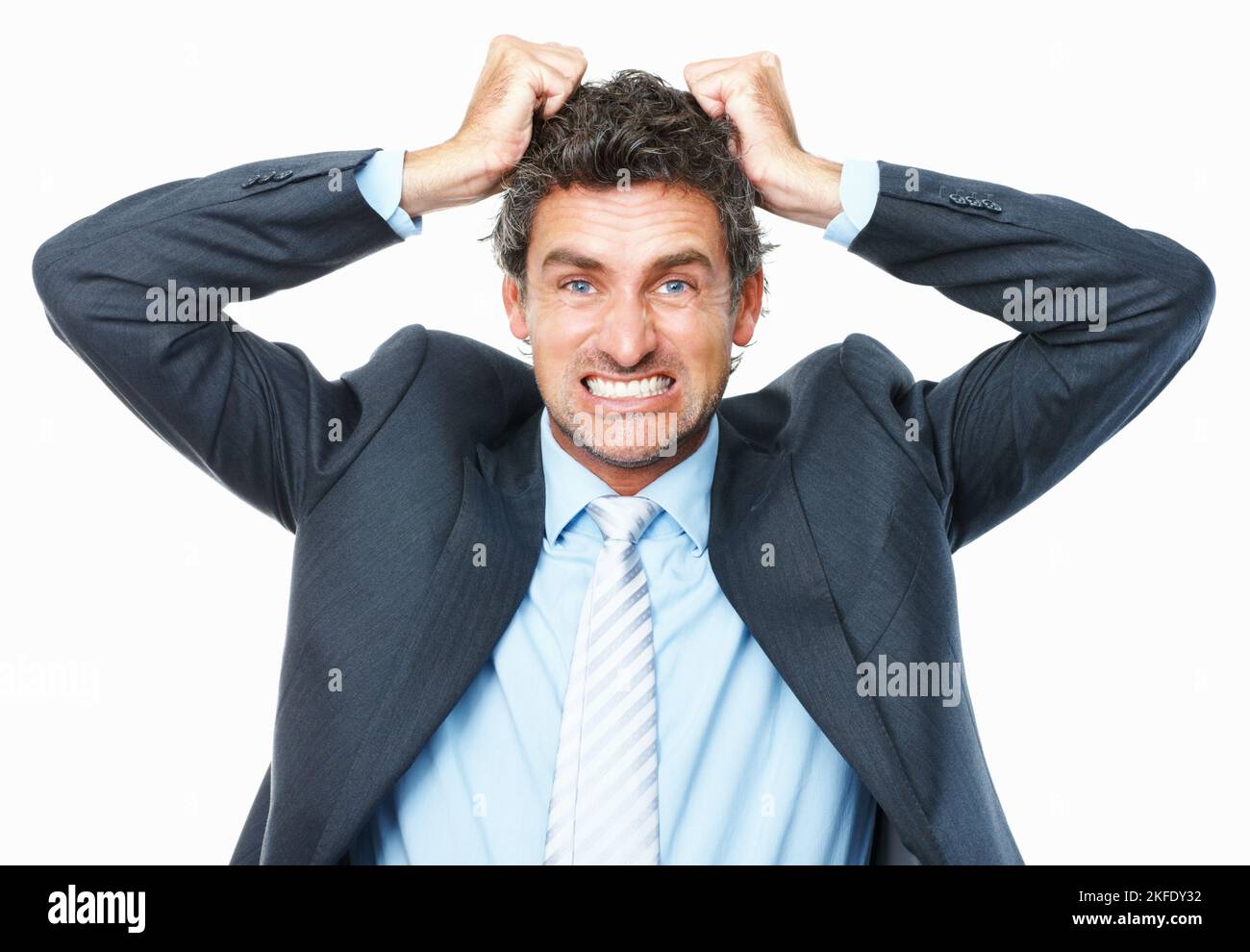 Frustrated business man. Portrait of frustrated business man pulling ...