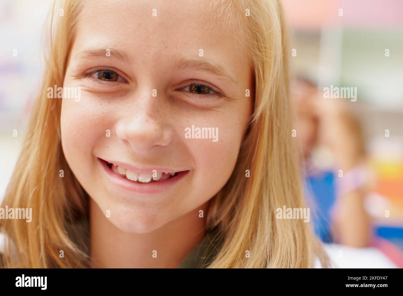 Loving each day, learning new things. Closeup of a cute young primary ...