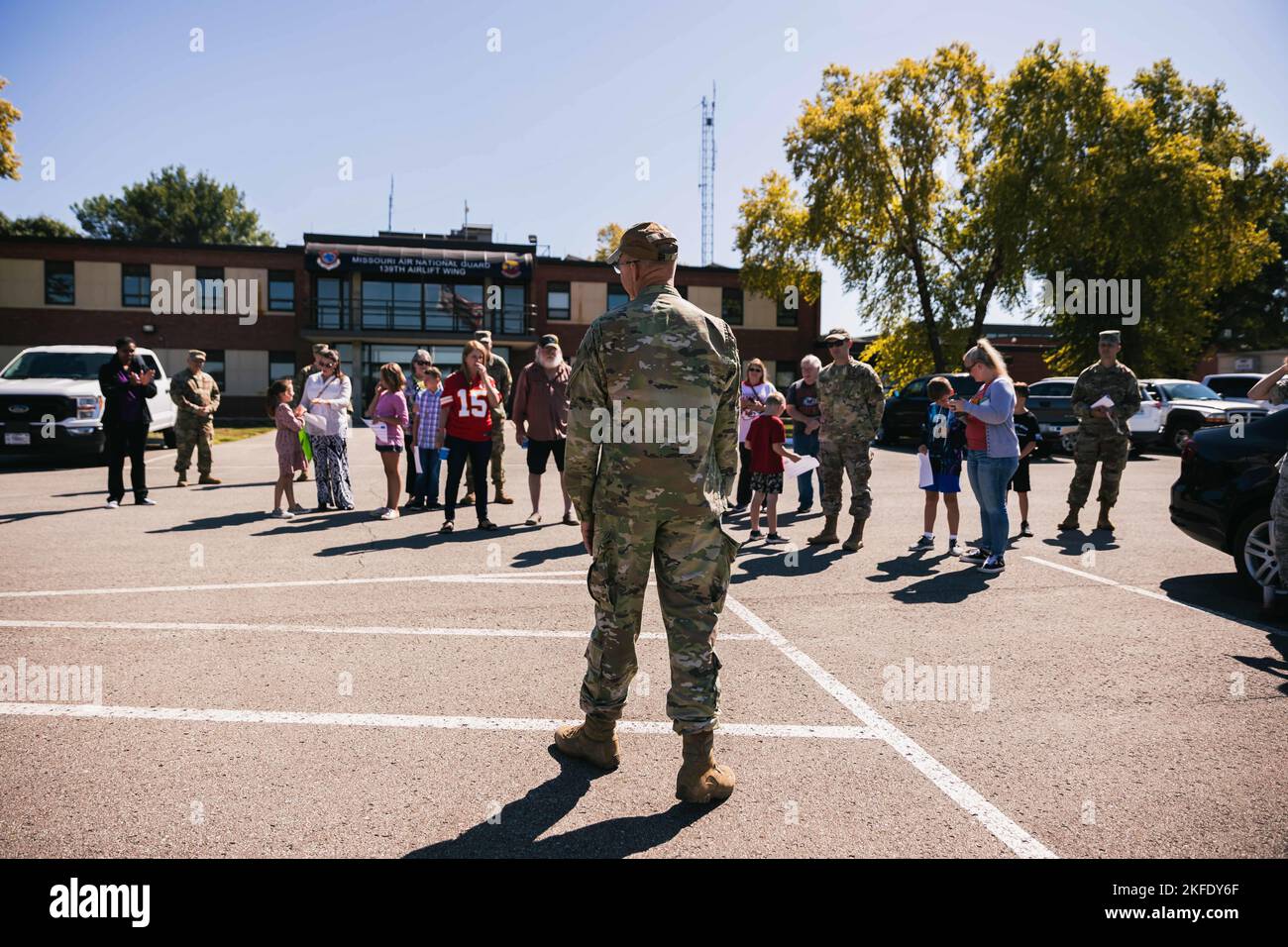 U.S. Air Force Col. Gordon Meyer speaks to airmen and their families ...
