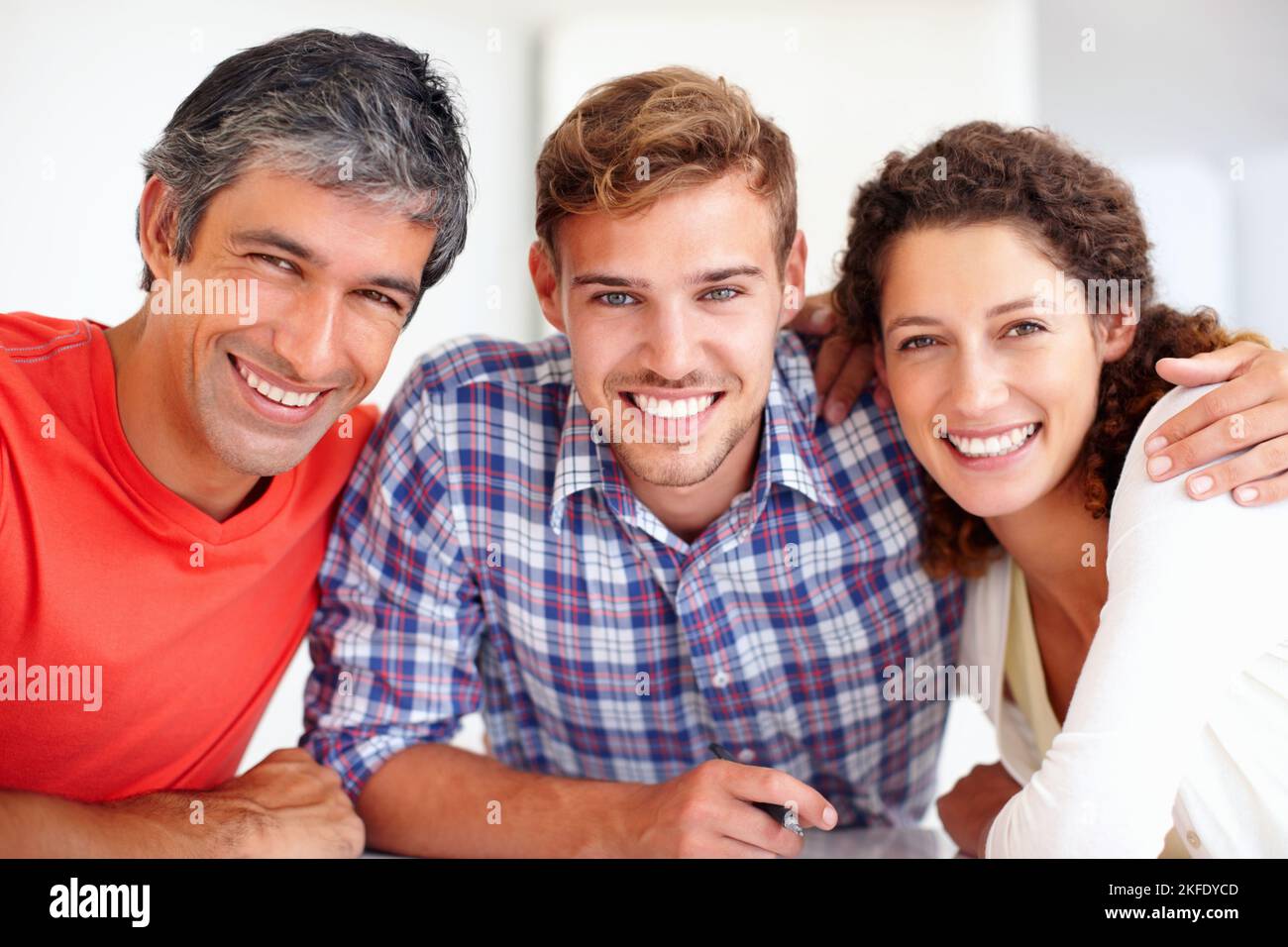 Smiling colleagues. Portrait of business colleagues giving you an ...