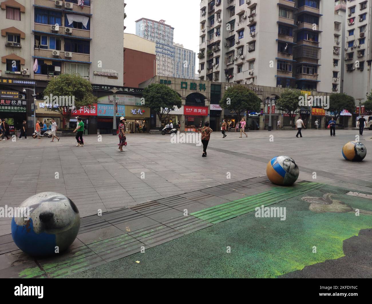 Four stone piers painted with funny dog face attract passers-by's ...