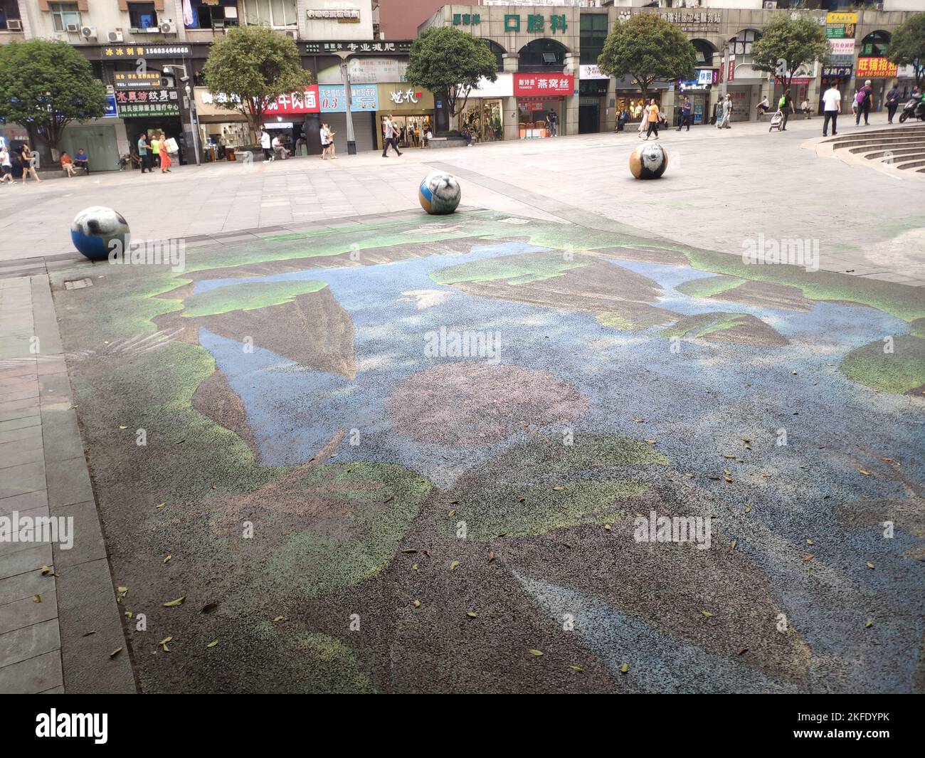 Four stone piers painted with funny dog face attract passers-by's ...